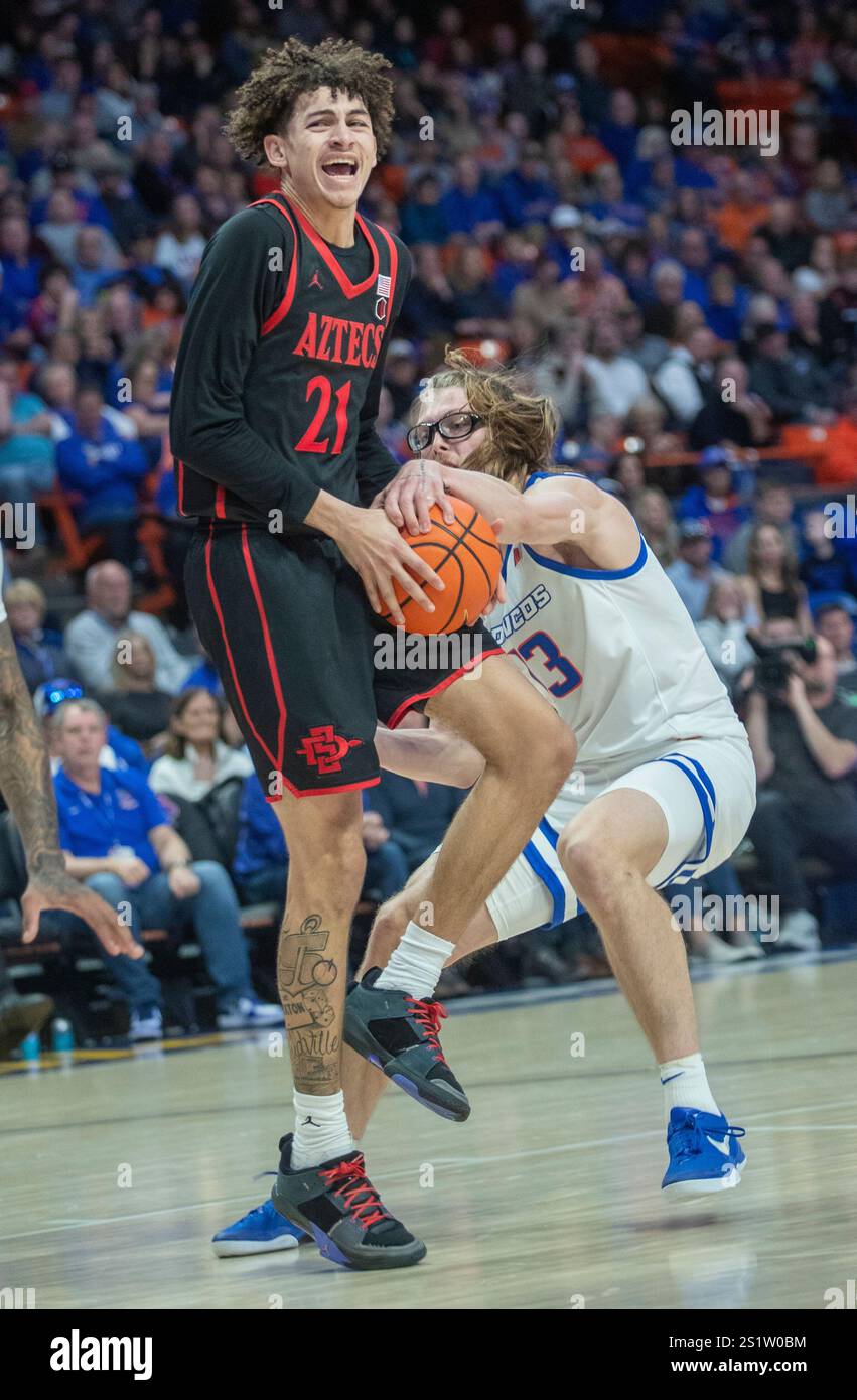 San Diego State's Miles Byrd (21) is fouled by Boise State's Andrew ...