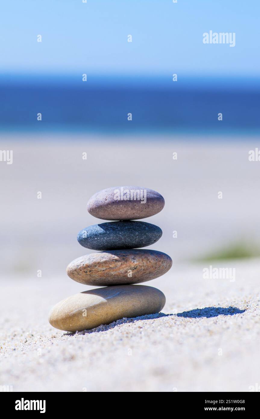 Round pebbles on the beach in Denmark is a symbol for balance. Stones ...