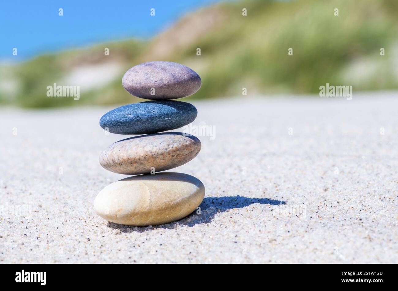 Round pebbles on the beach in Denmark is a symbol for balance. Stones ...