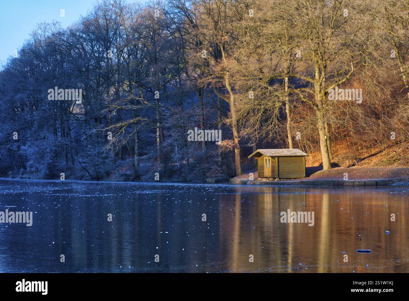 Beautiful winter landscape with ice and frost in the sunshine ...