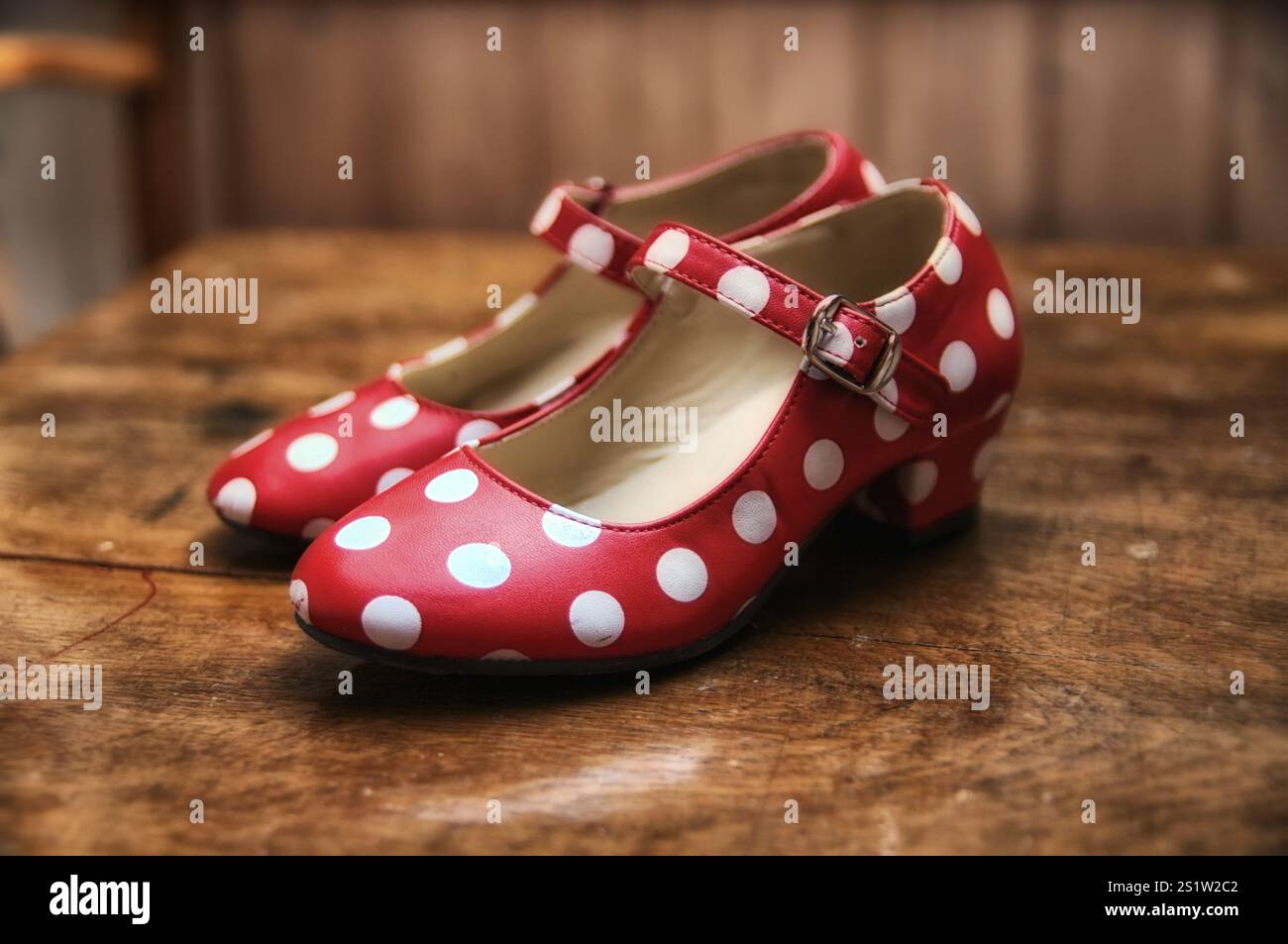Red dance shoes with white dots Stock Photo - Alamy