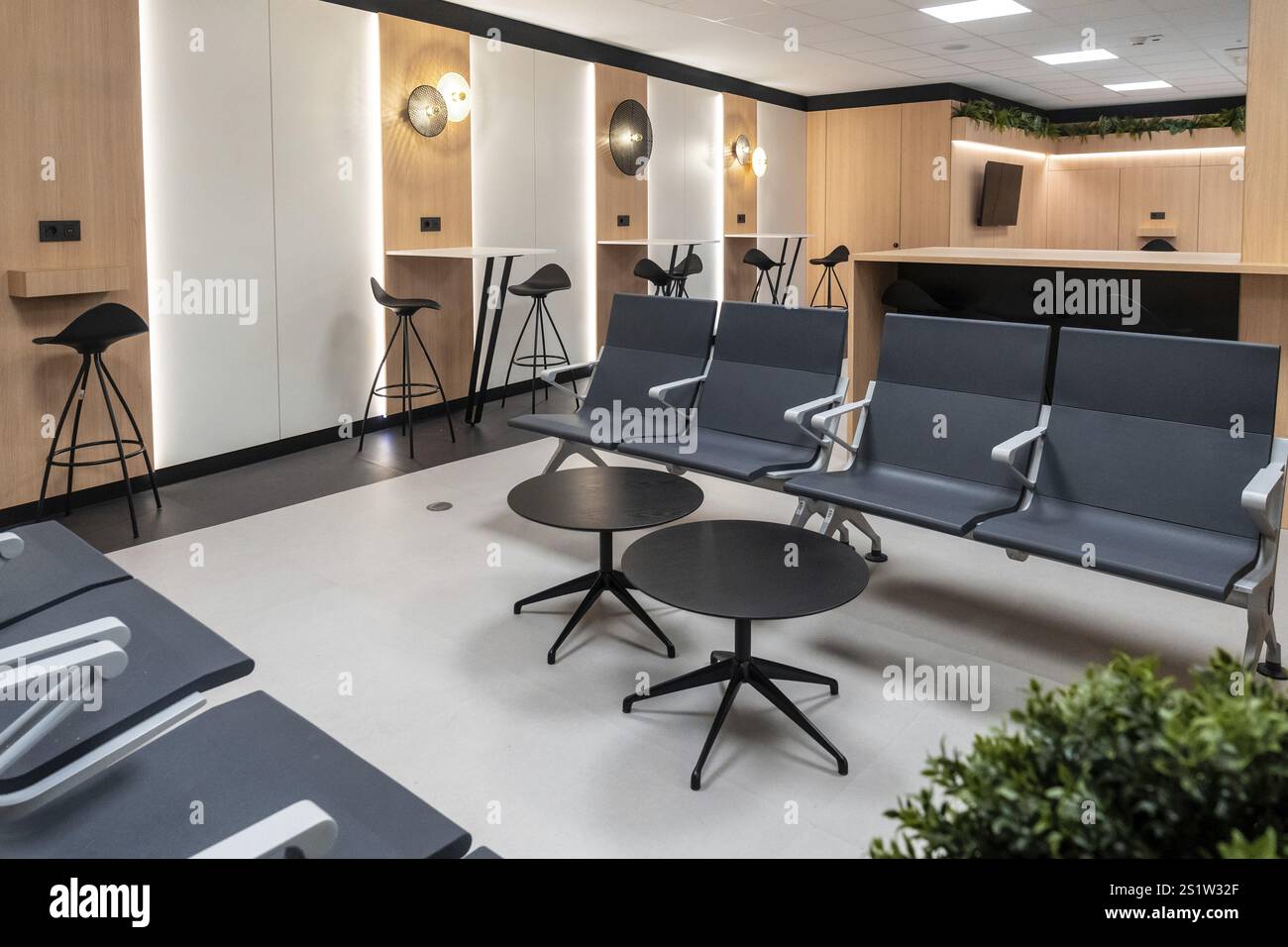 Contemporary airport lounge providing travelers with comfortable ...