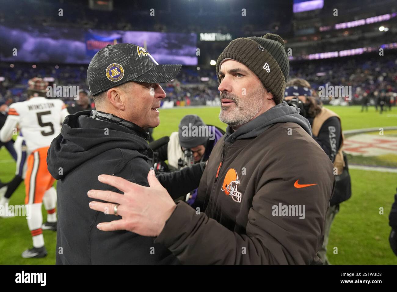 Baltimore Ravens head coach John Harbaugh, left, and Cleveland Browns ...