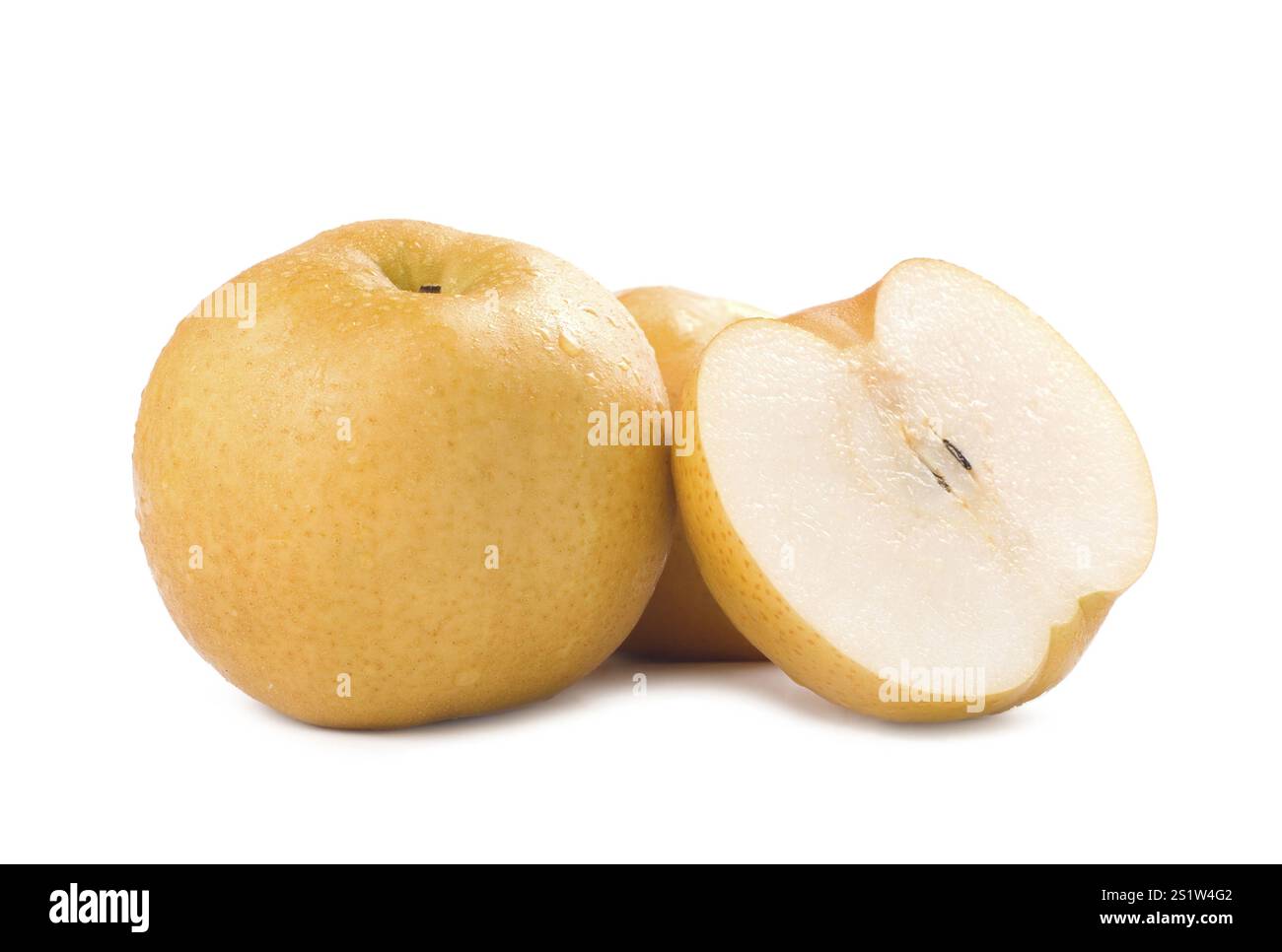 Whole and sliced Asian pear presenting a fresh, juicy appearance on a ...