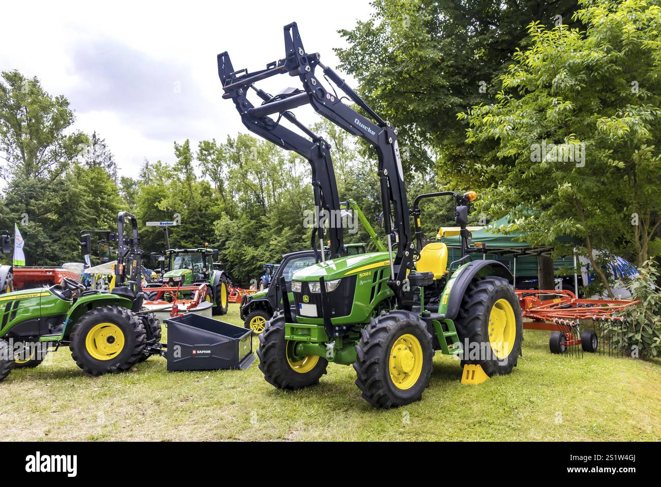 Germany - WETZLAR JULY 08: JOHN DEERE Tractor with hydraulic grab. John ...