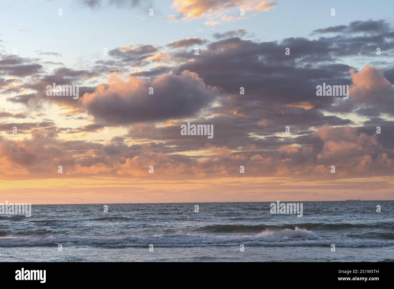 Sunset at the North Sea beach of Denmark with beautiful light on a ...