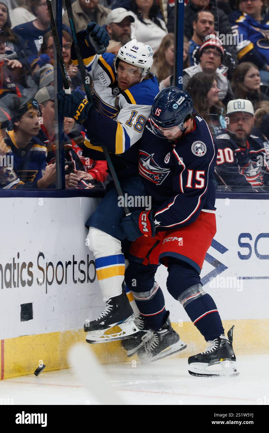 Columbus Blue Jackets' Dante Fabbro, right, checks St. Louis Blues ...