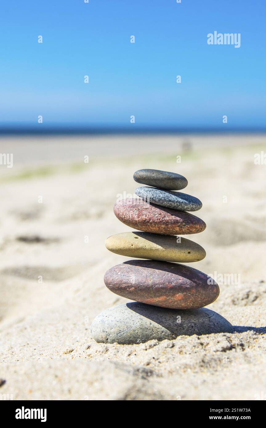 Round pebbles on the beach in Denmark is a symbol for balance. Stones ...