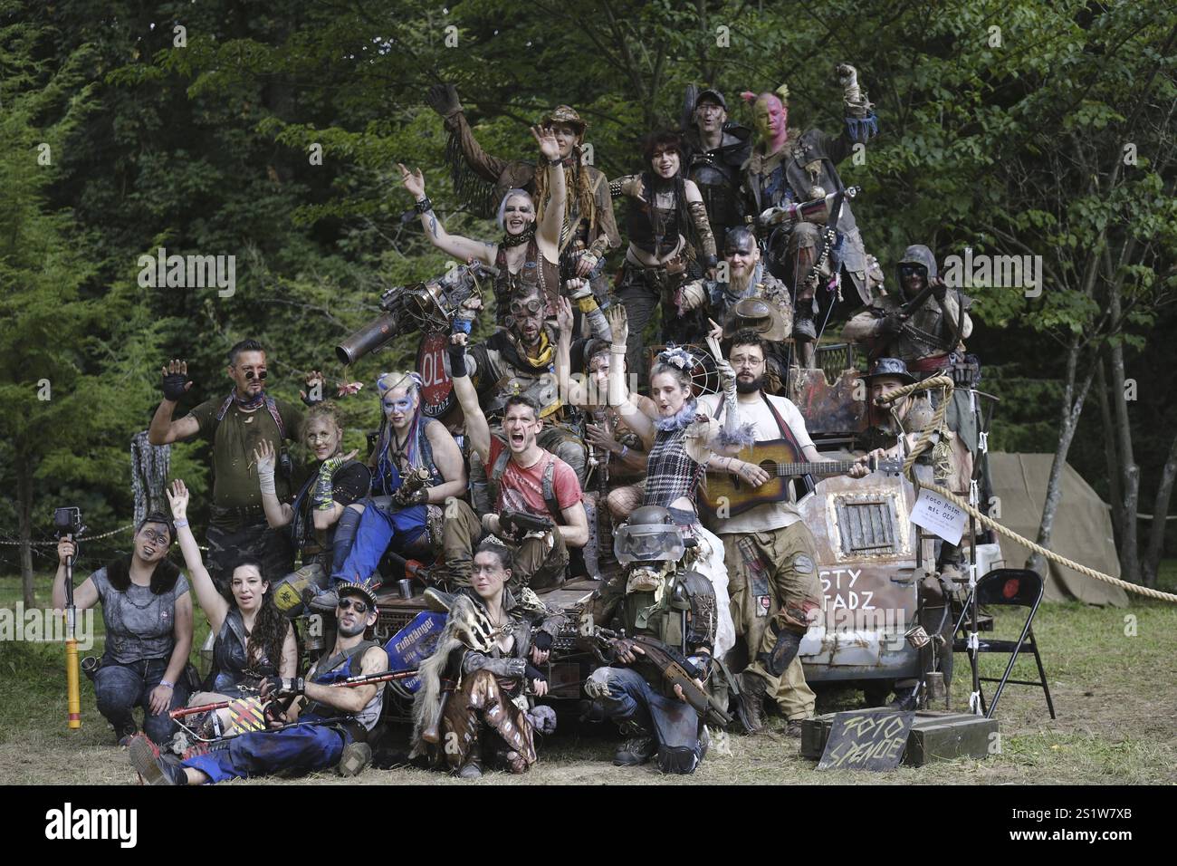 Group of costumed people in a post-apocalyptic setting outdoors Stock ...