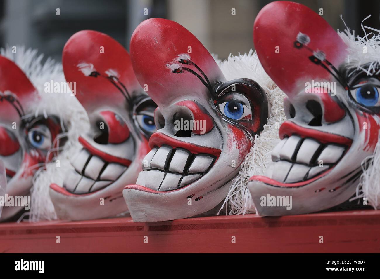 Clown masks with large teeth and blue eye accent, cheerful and scary ...