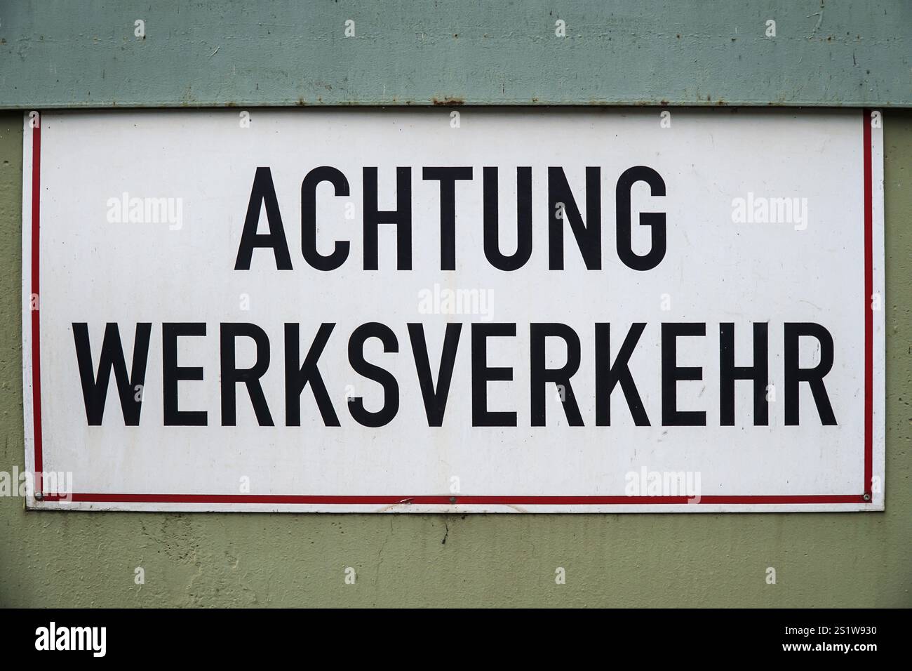 Signage on wall - Attention factory traffic Stock Photo - Alamy