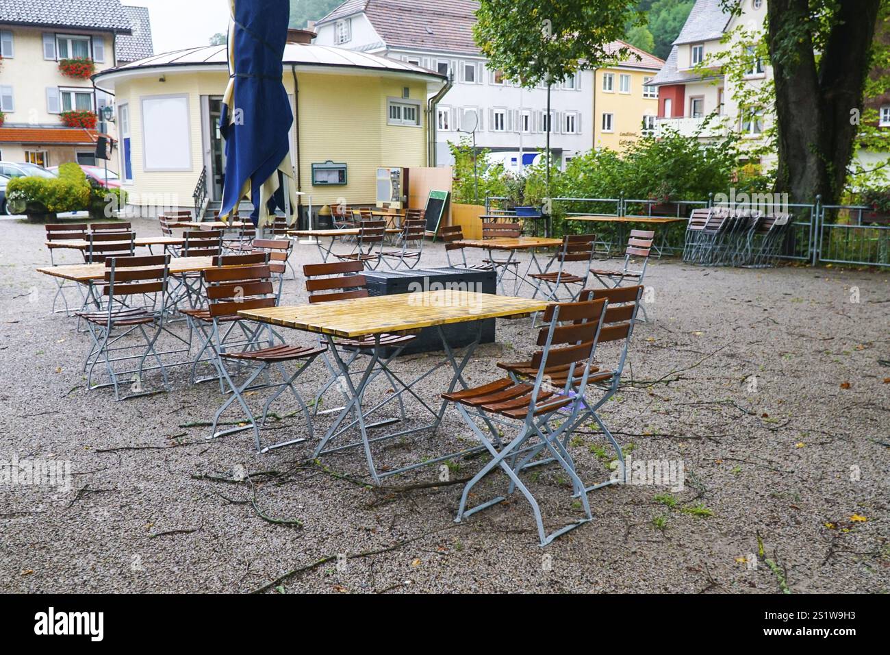 Beer garden without visitors in rainy weather Stock Photo - Alamy