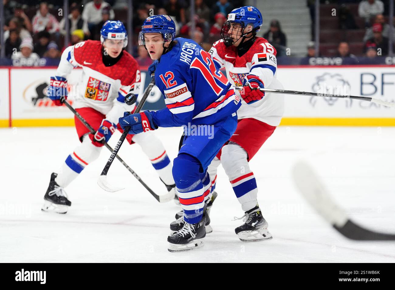 Ottawa, Canada. 04th Jan, 2025. USA forward James Hagens (12) moves the ...