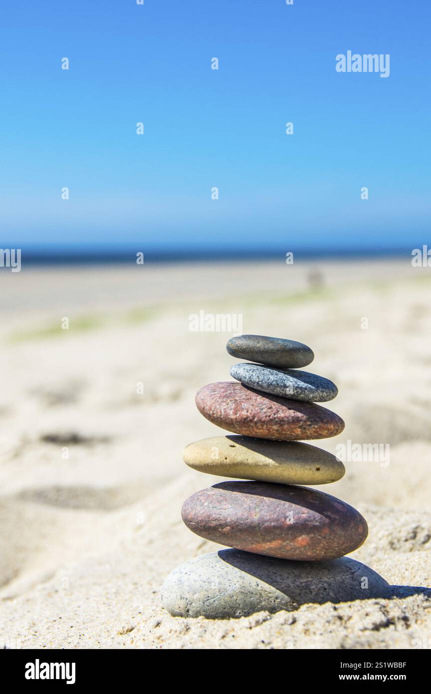 Round pebbles on the beach in Denmark is a symbol for balance. Stones ...
