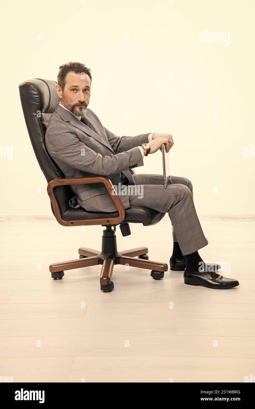 business success. professional leader ceo. businessman in office chair ...