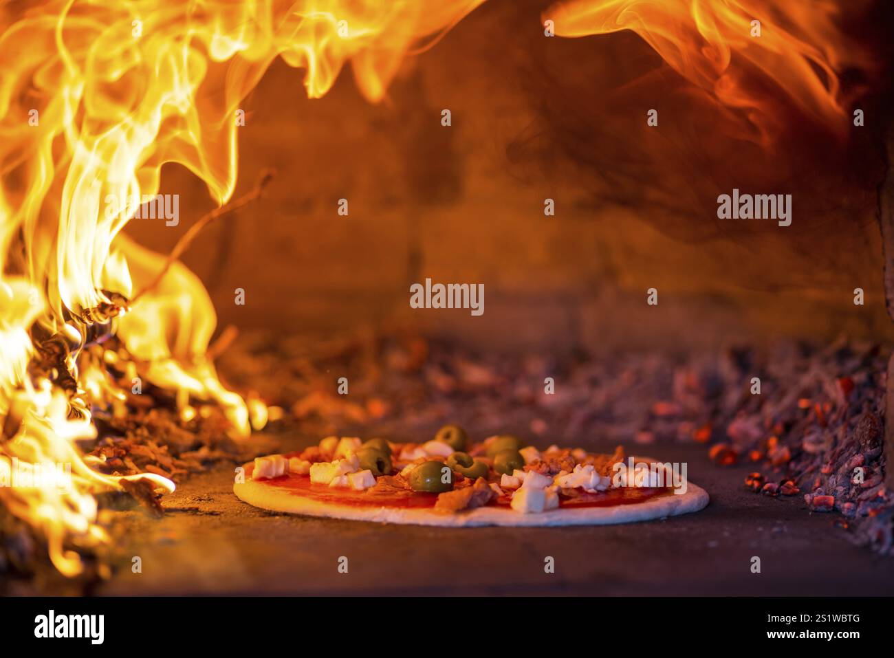Original Italian pizza from the wood fire oven Stock Photo - Alamy