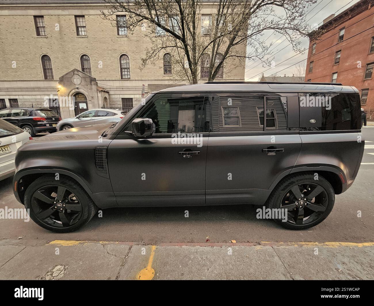New York City, USA - March 18, 2024: Land Rover Defender matte black ...