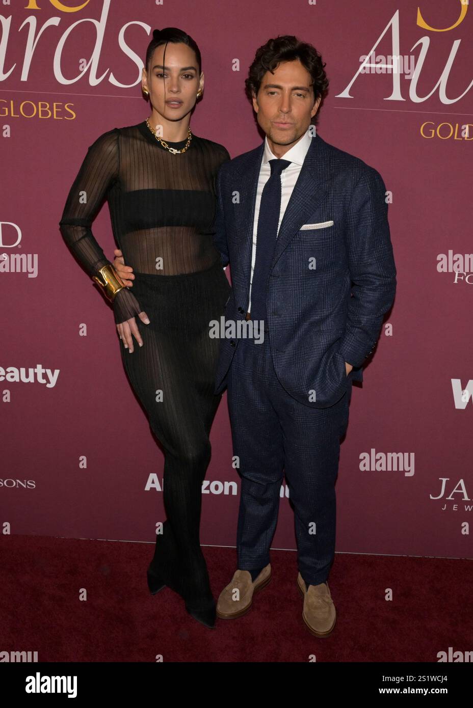03 January 2025 - Beverly Hills, California - Adria Arjona and Ivan Pol 2025 WWD Style Awards at ...