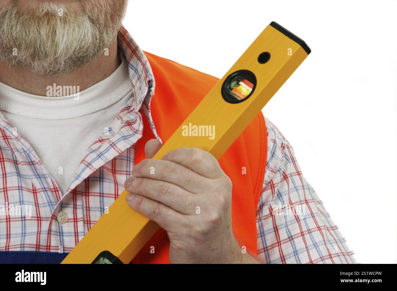 Craftsman with spirit level on light background Stock Photo - Alamy