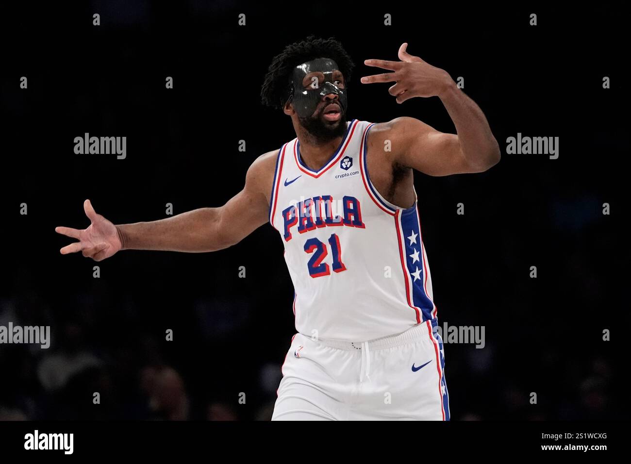 Philadelphia 76ers' Joel Embiid (21) gestures after making a three ...