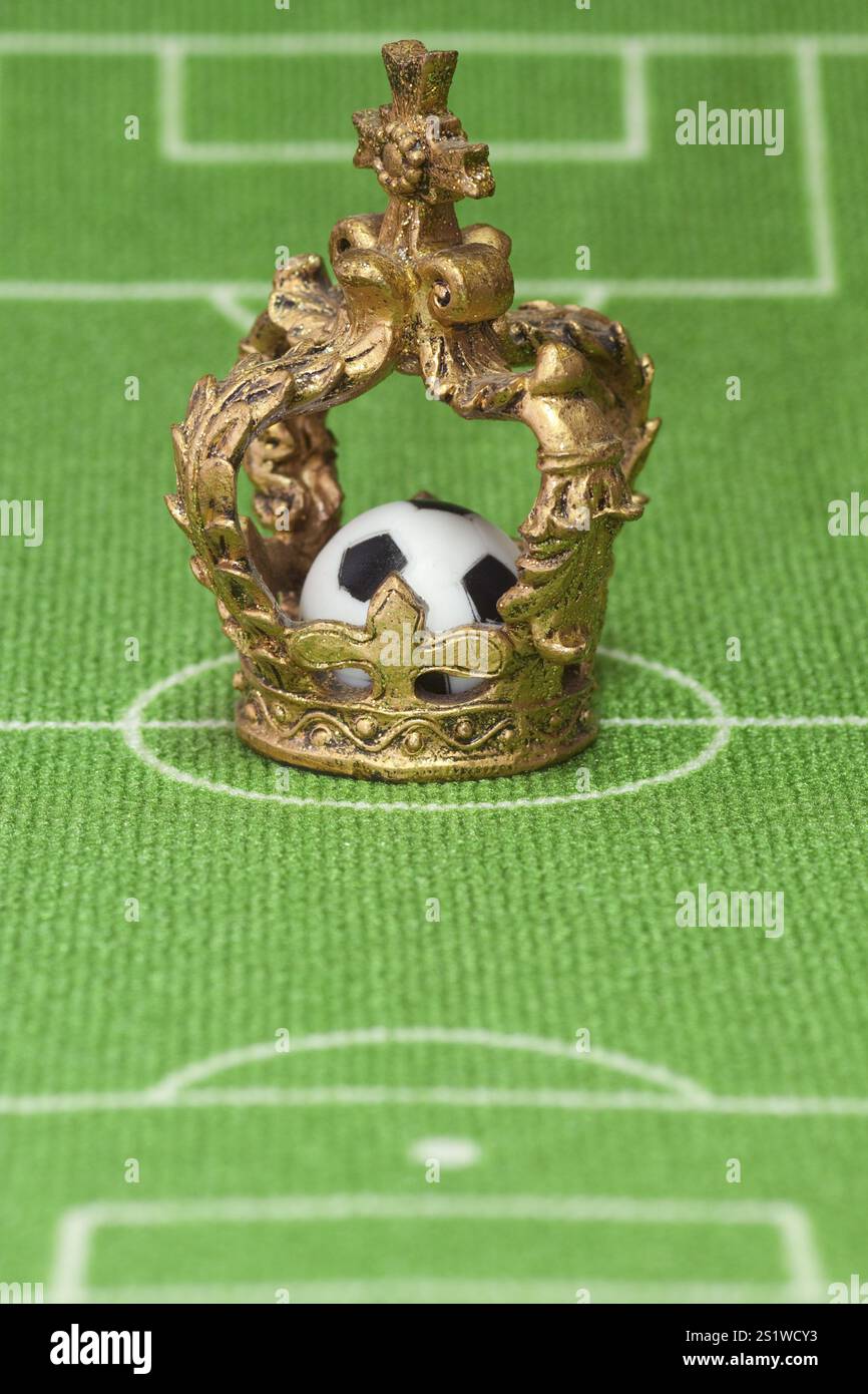 Symbol photo - Crown on football pitch Stock Photo - Alamy