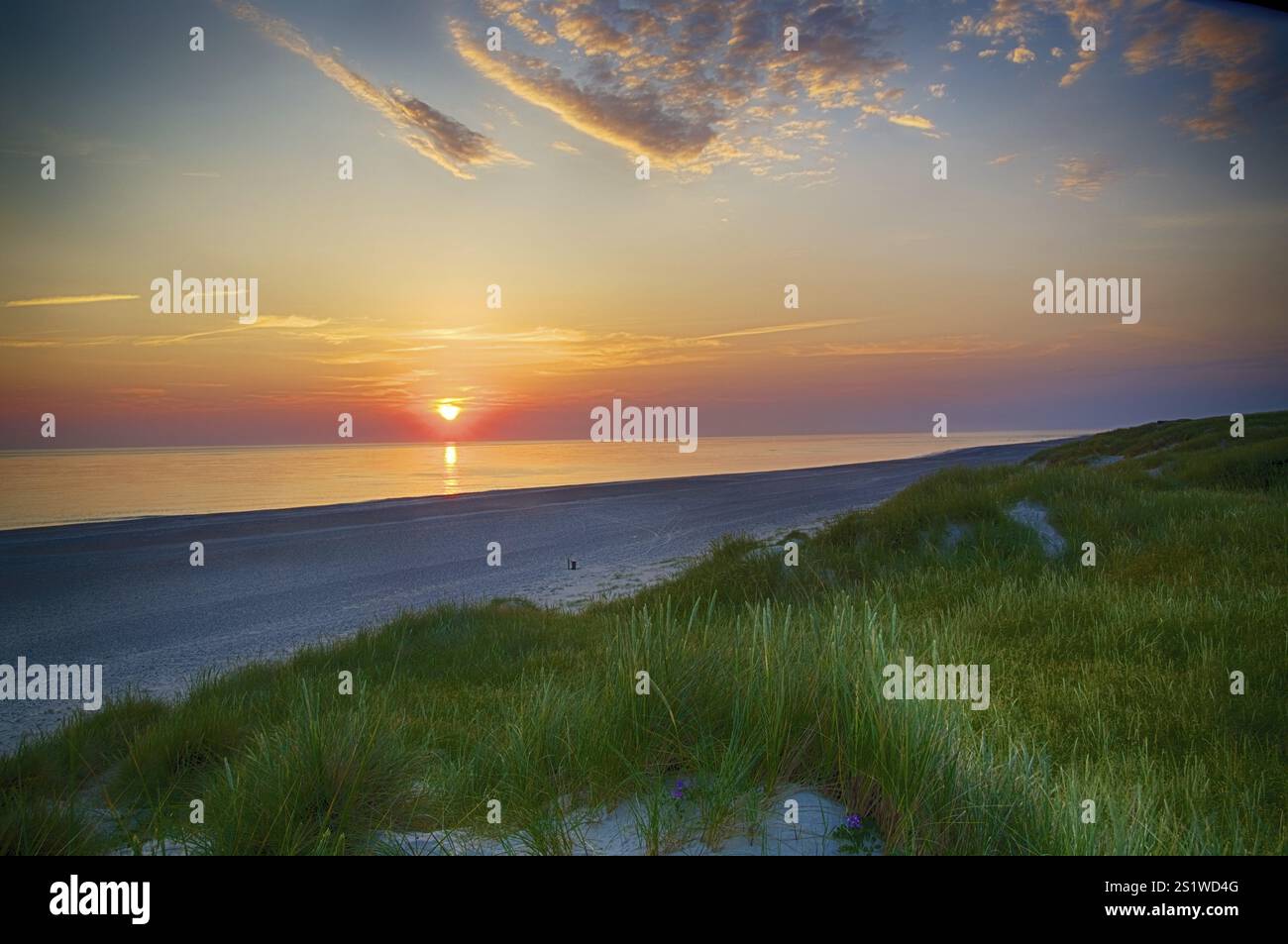 Beautiful sunset at the north sea coast of Denmark in summertime Stock ...