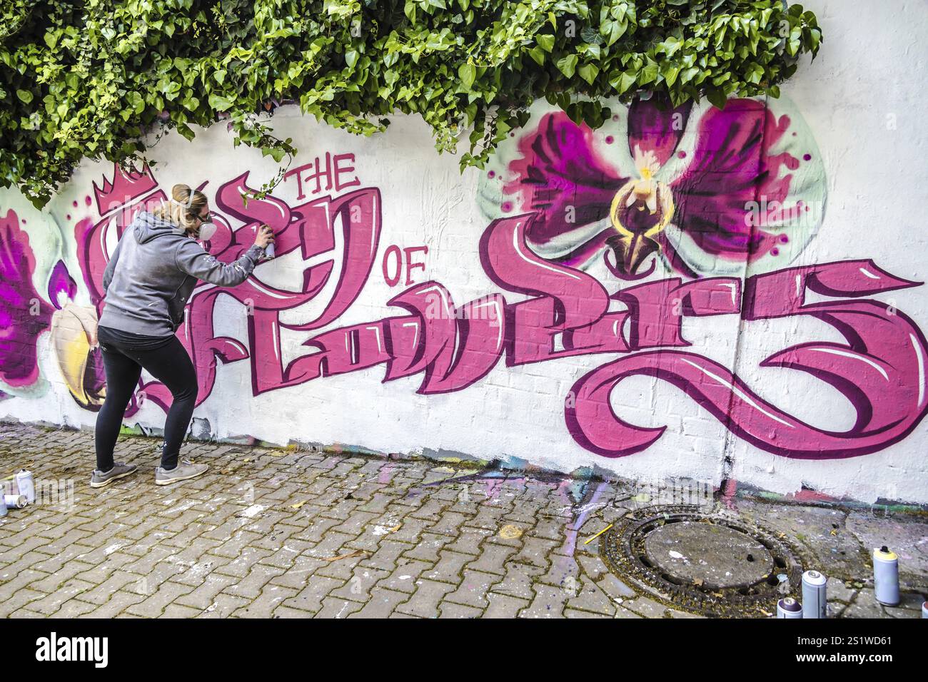 WETZLAR, Germany - 23.05.2021: Young female artist doing artificial ...
