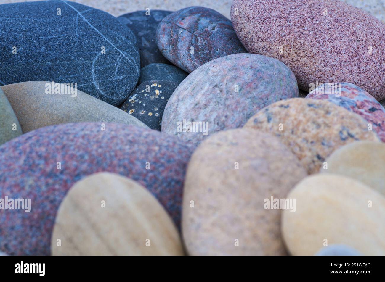 Round pebbles on the beach in Denmark is a symbol for harmony. Stones ...