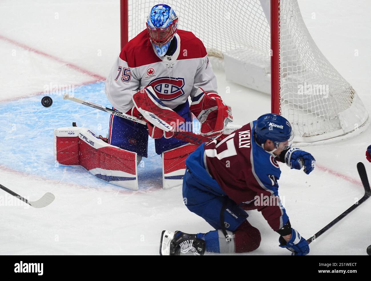 Montreal Canadiens goaltender Jakub Dobes, back, deflects a shot by ...