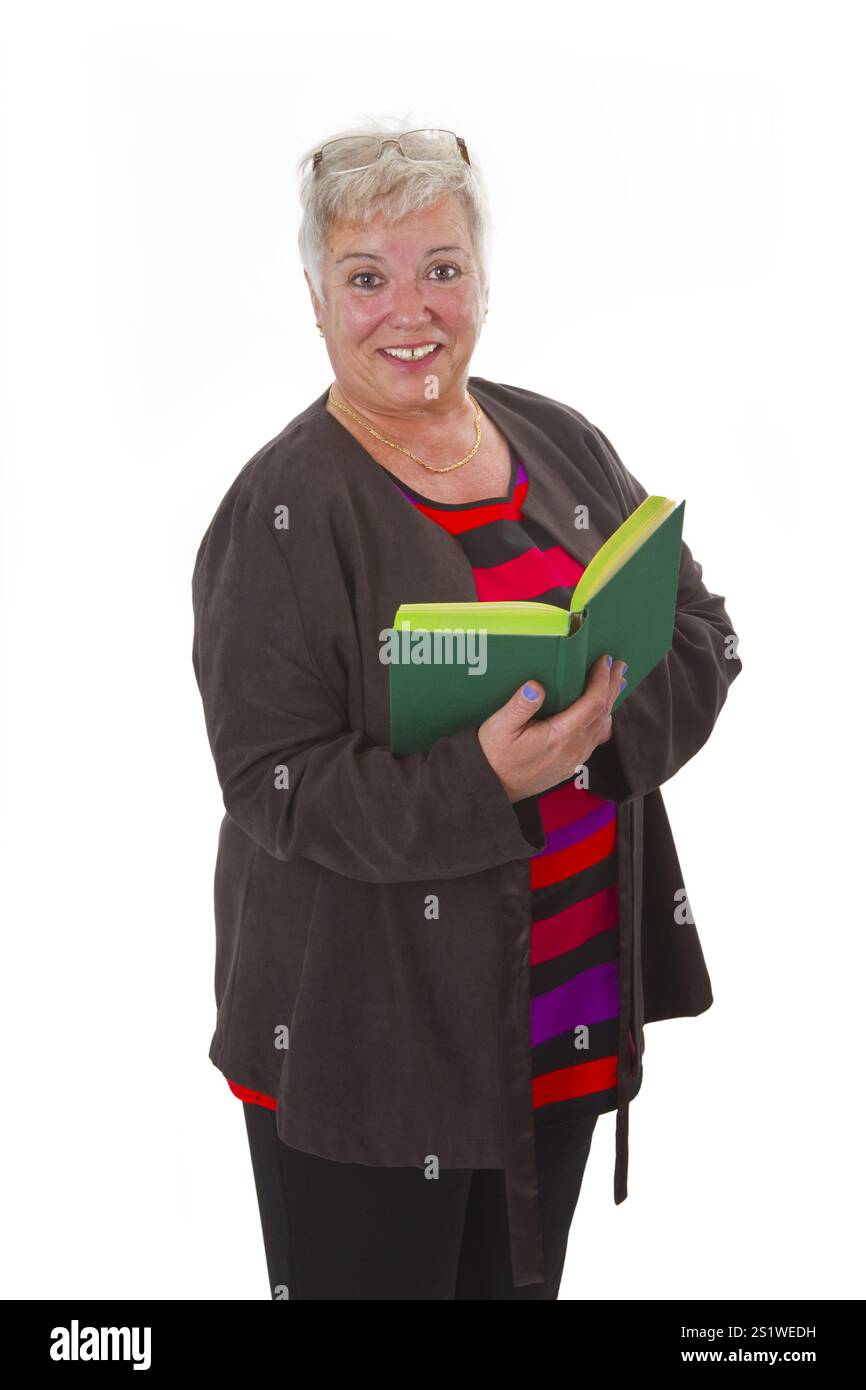 Senior citizen reading a book - cropped on a white background Stock ...