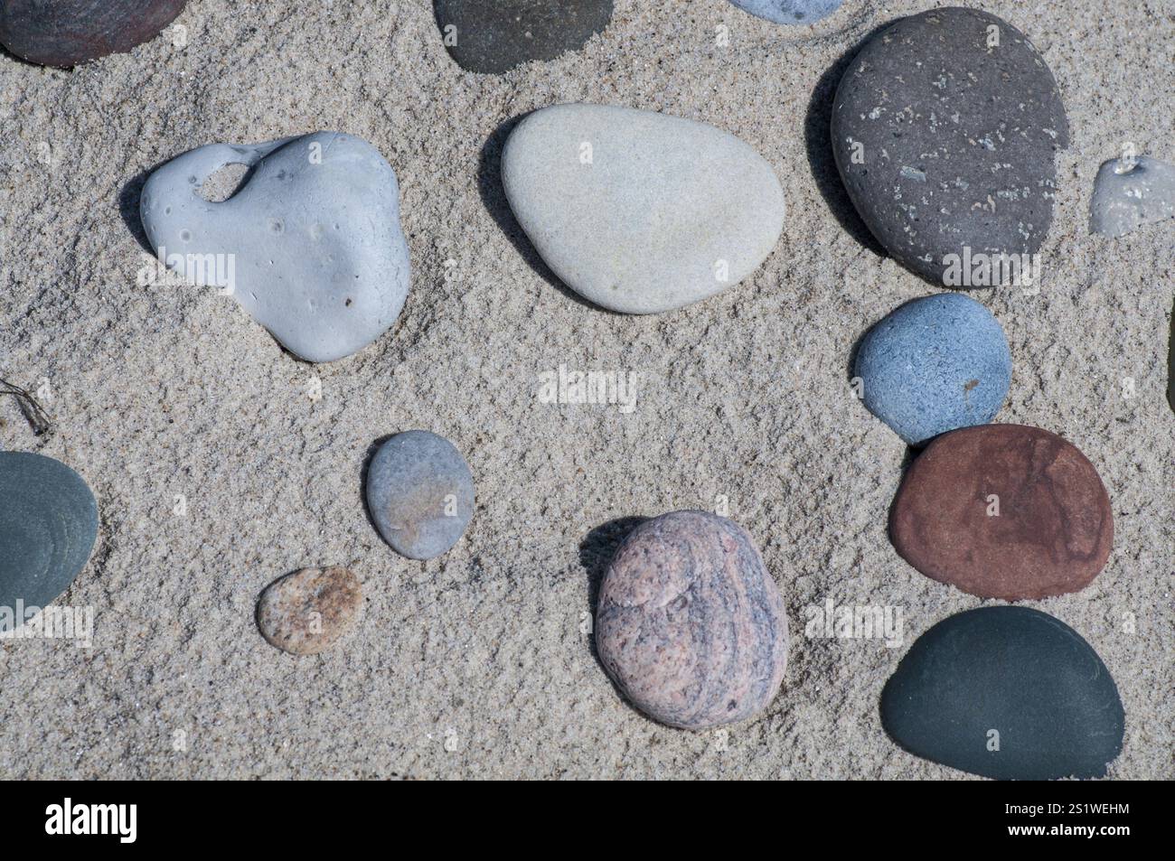 Round pebbles on the beach in Denmark is a symbol for balance. Stones ...