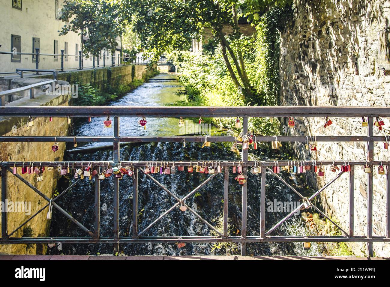 Locks on bridge railings - traditional romantic custom Stock Photo - Alamy