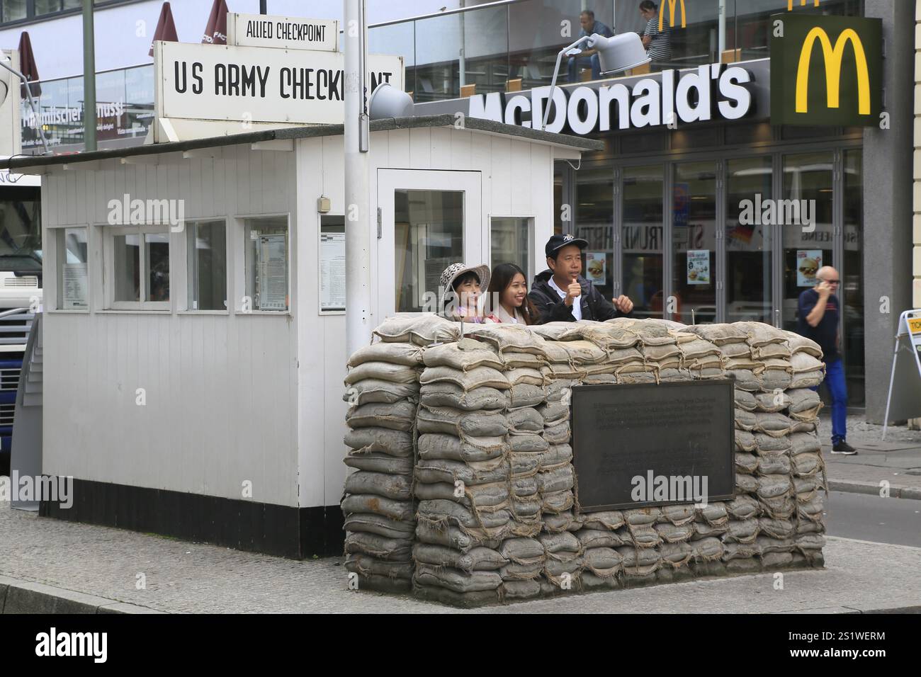 Former border crossing Checkpoint Charlie in Friedrichstrasse, Asian ...