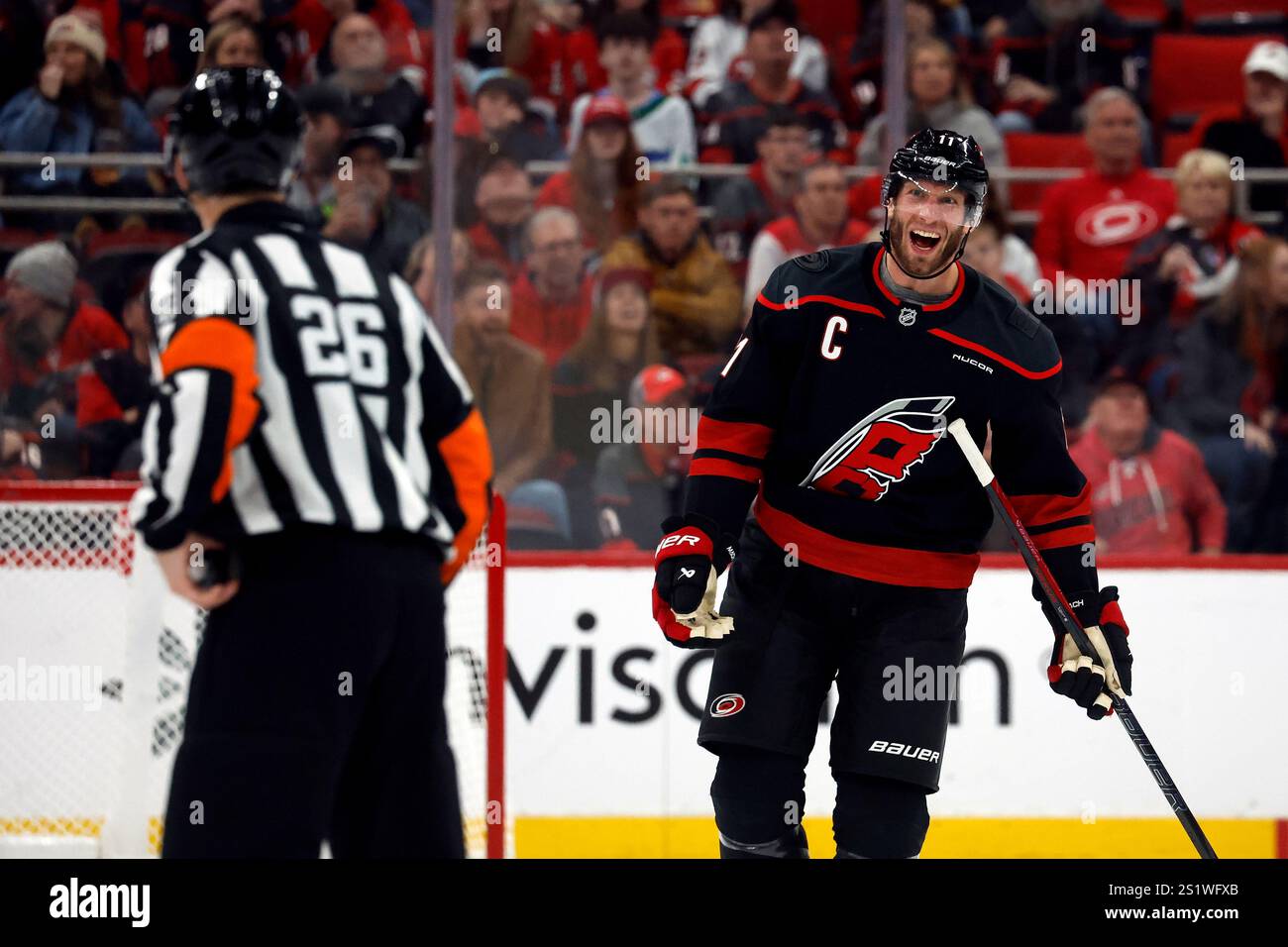 Carolina Hurricanes' Jordan Staal (11) protests a call with an official ...