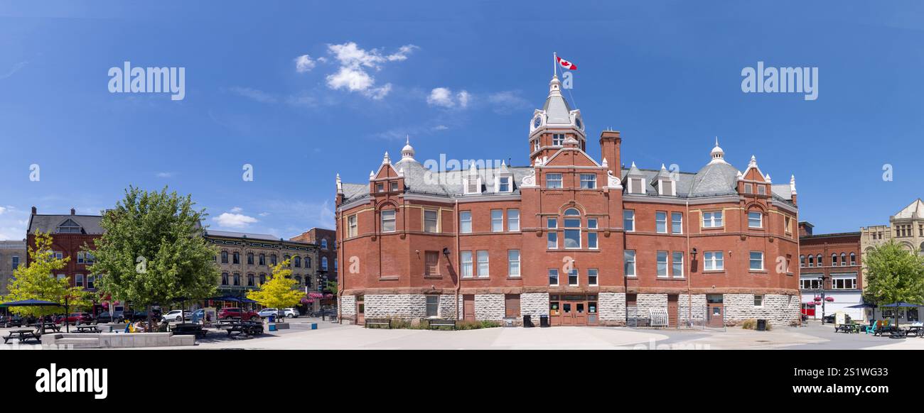 Red brick city hall with a clock tower in the scenic historic center in ...