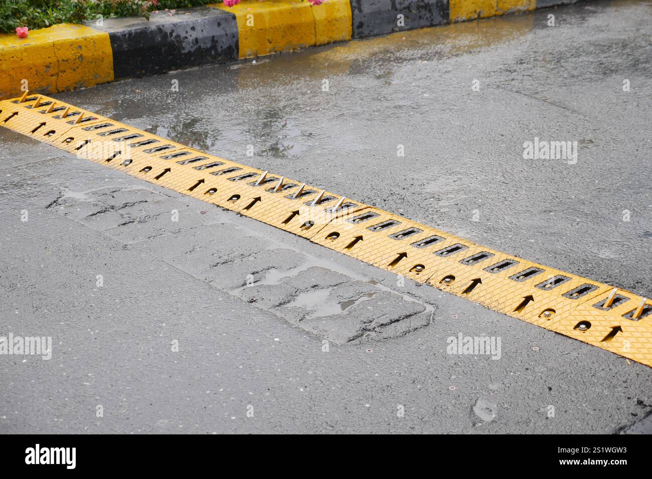 Promoting Road Safety Importance of Yellow Speed Bump During Rainy ...