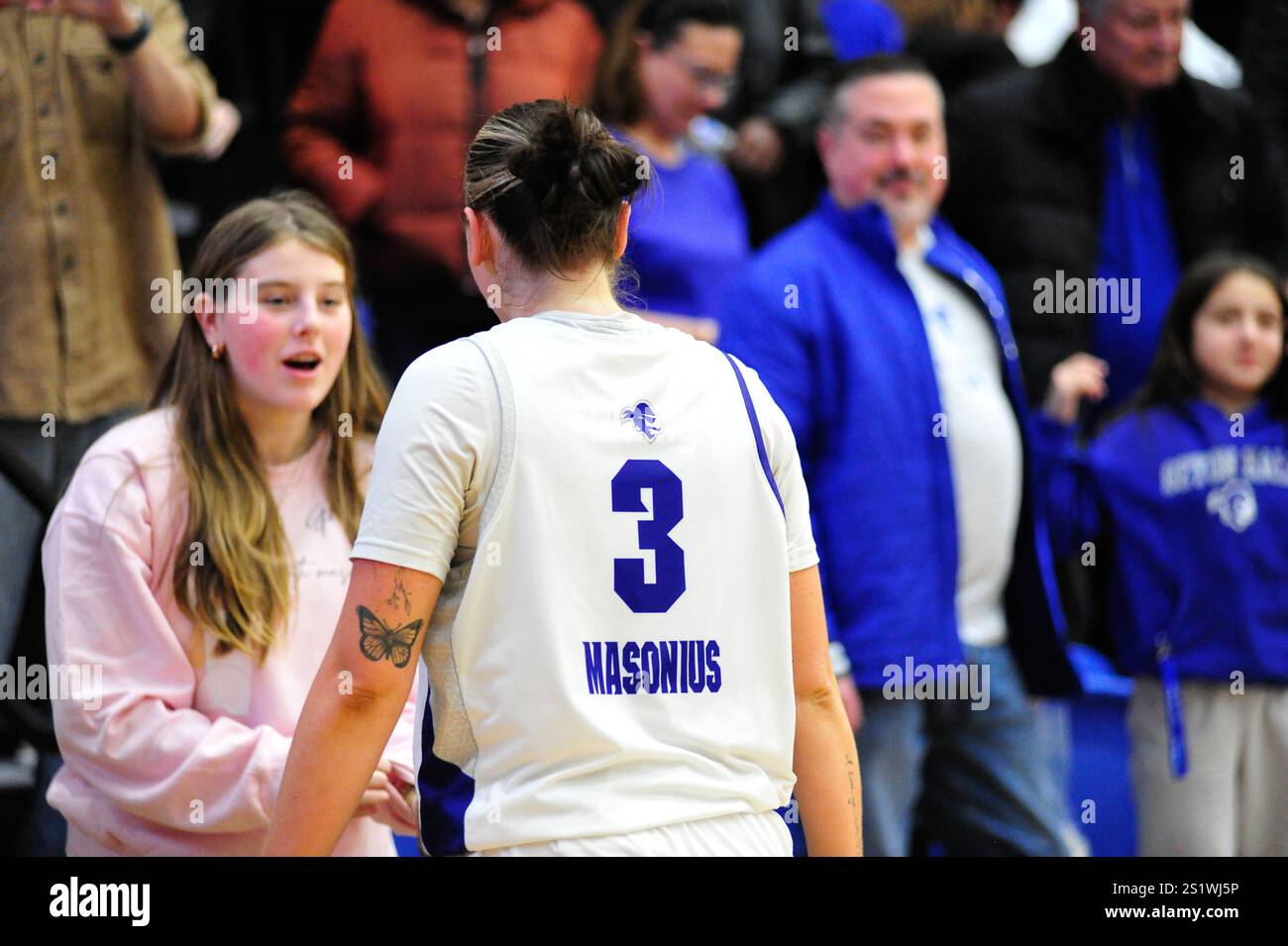South Orange, USA. 04th Jan, 2025. Faith Masonius (3) greets a fan ...