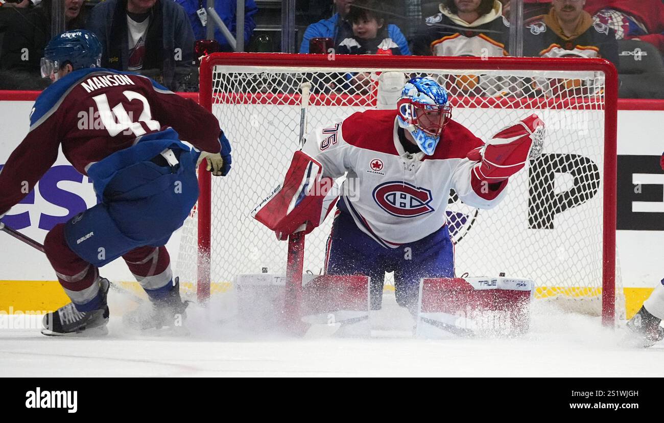 Montreal Canadiens goaltender Jakub Dobes, right, makes a glove save of ...