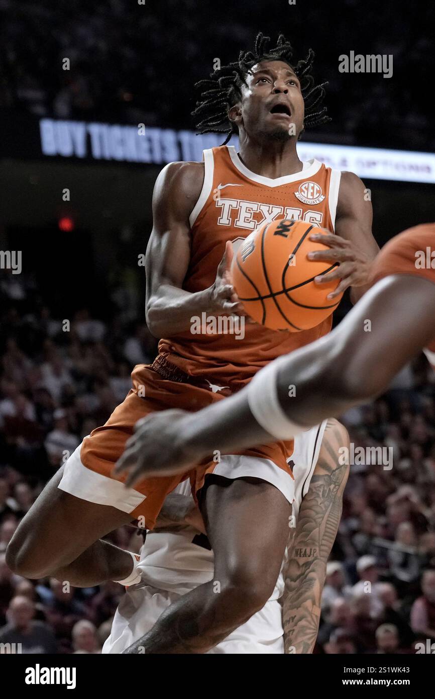 Texas guard Tramon Mark (12) gets around a Texas A&M defender for a ...