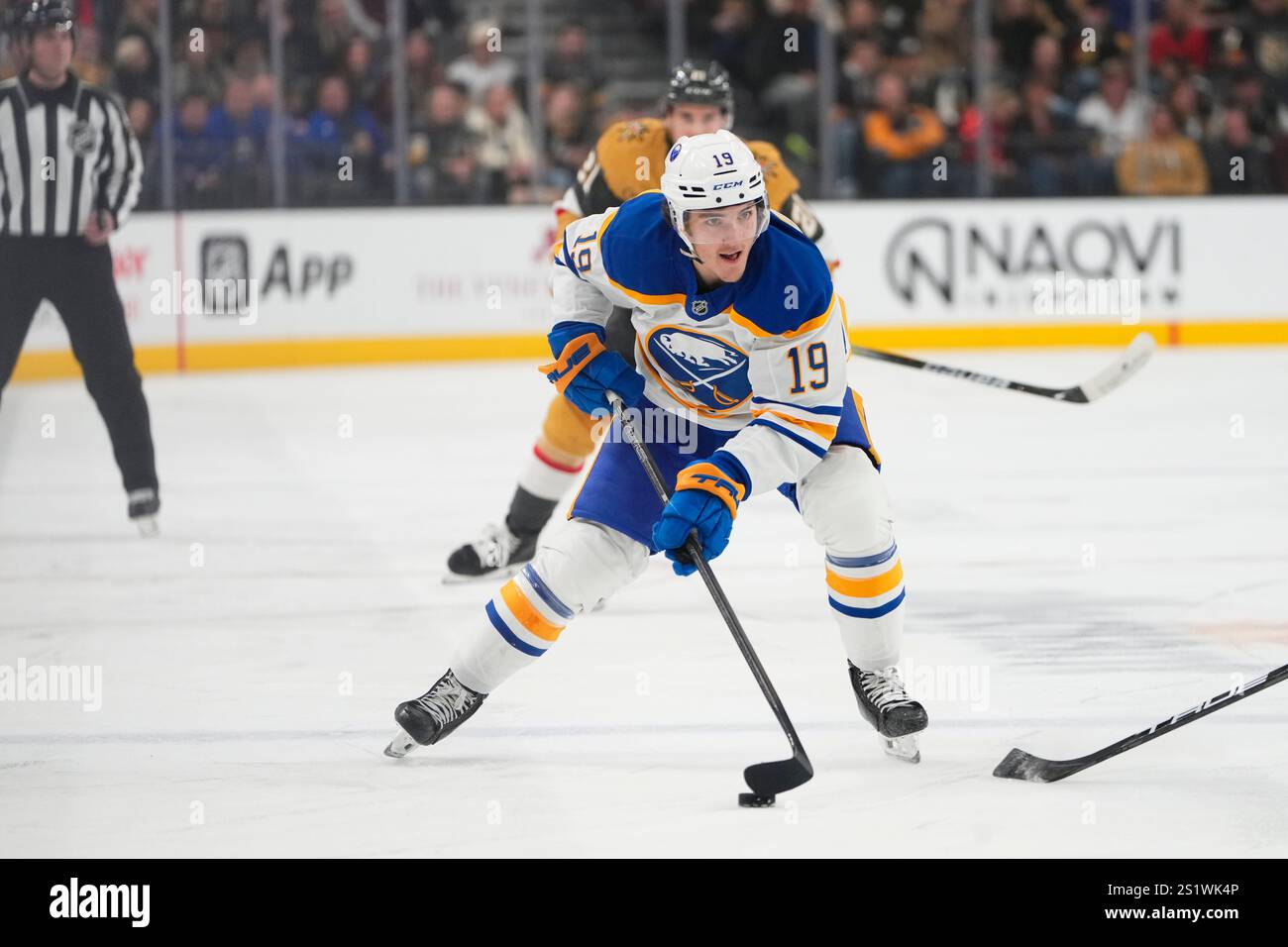 Buffalo Sabres center Peyton Krebs (19) skates with the puck against ...