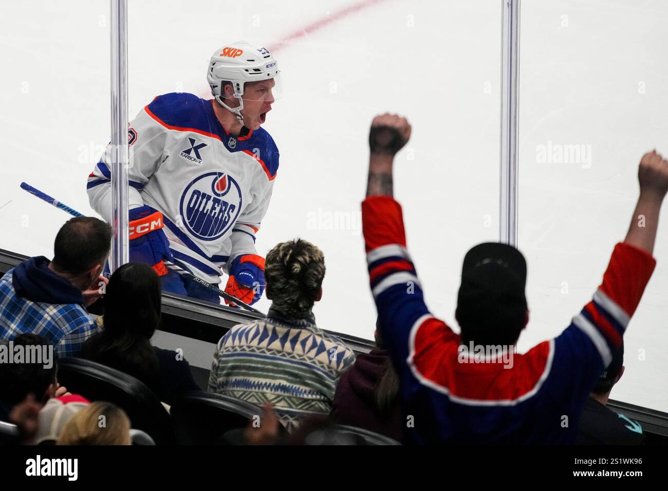 Edmonton Oilers center Jeff Skinner, top left, celebrates after scoring ...