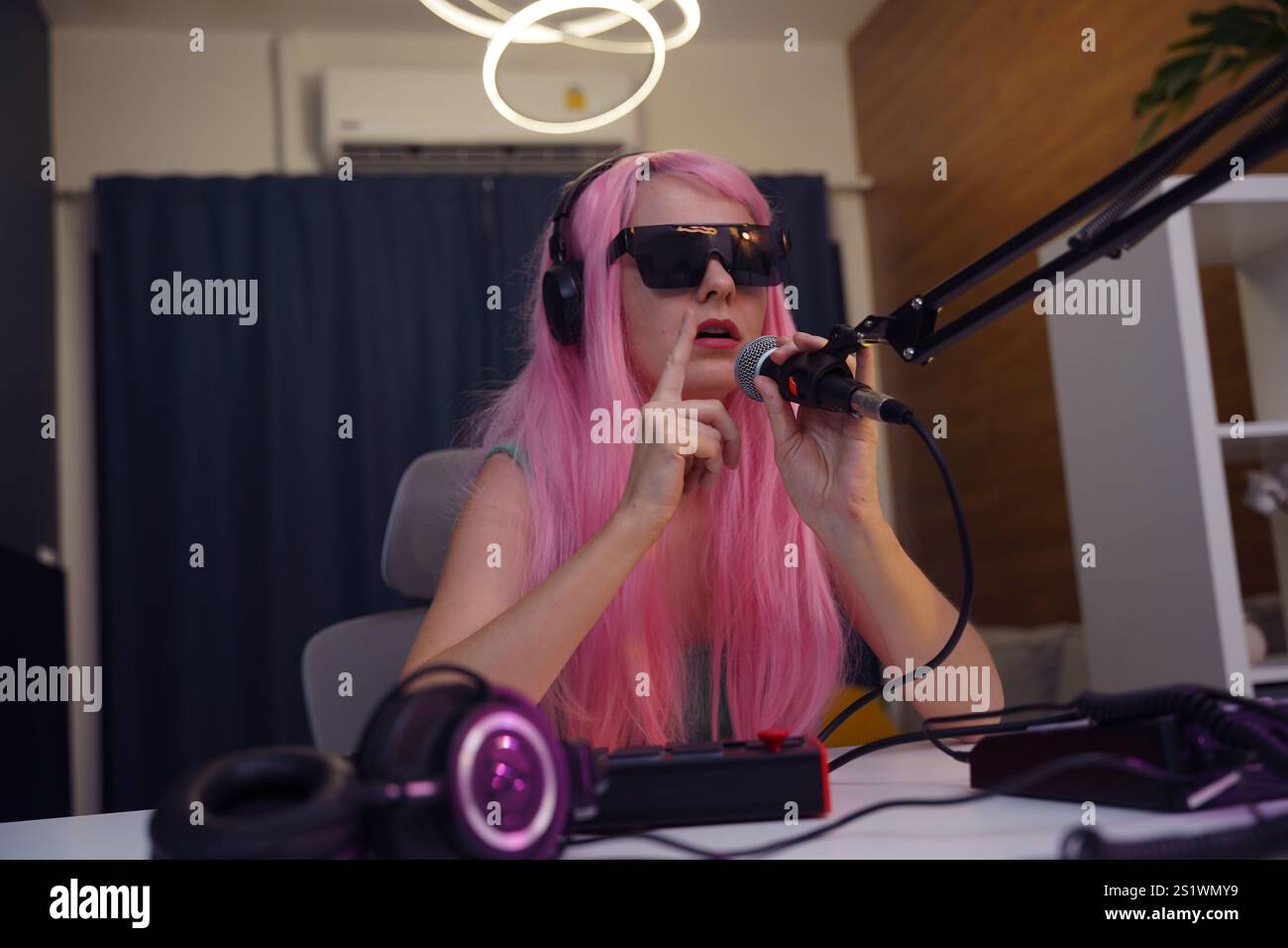 Beautiful young singer and musician broadcast from her home studio ...