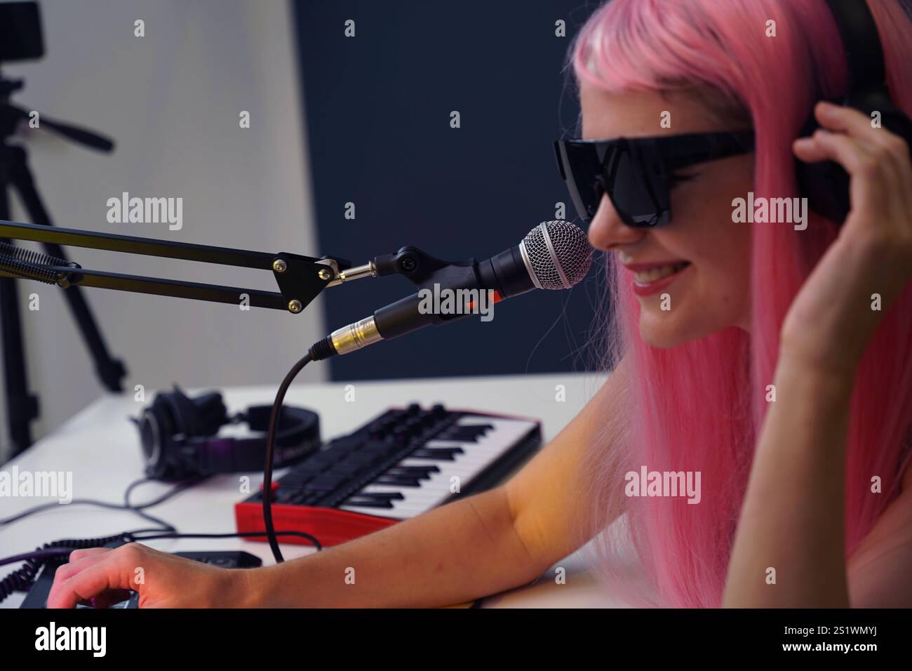 Beautiful young singer and musician broadcast from her home studio ...