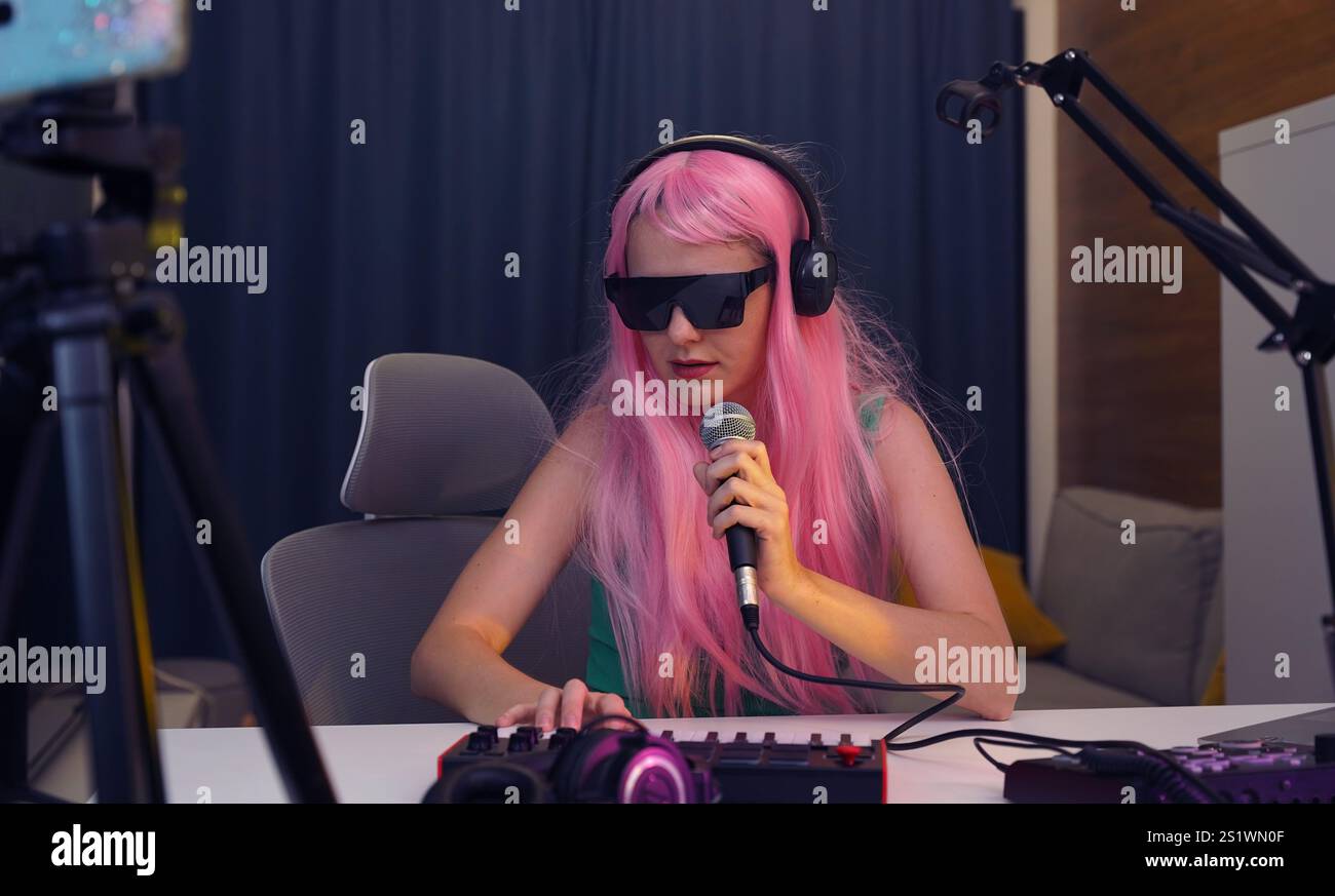 Beautiful young singer and musician broadcast from her home studio ...