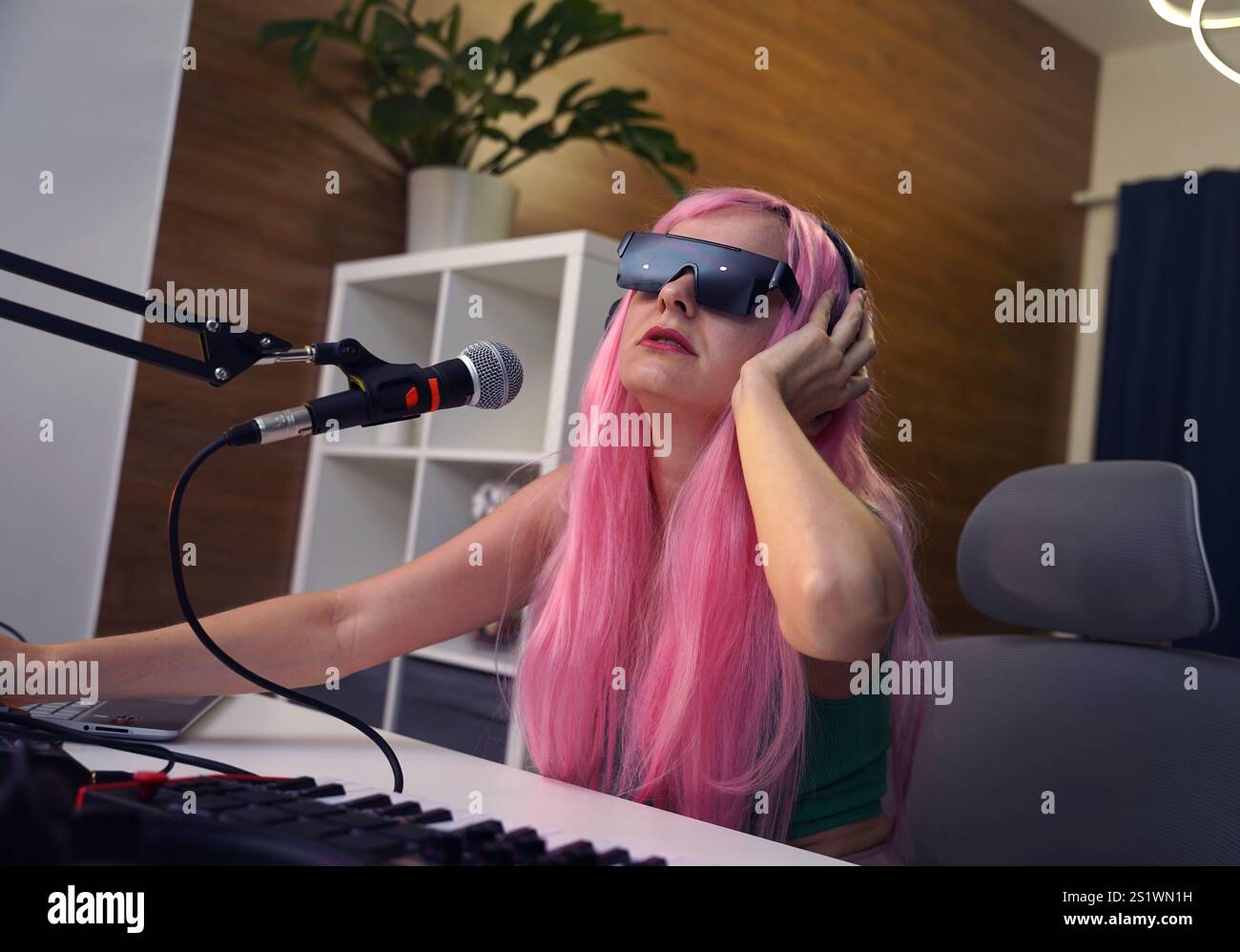 Beautiful young singer and musician broadcast from her home studio ...