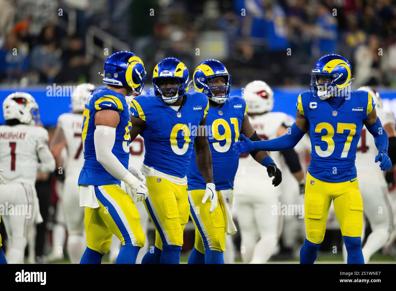 Los Angeles Rams linebacker Michael Hoecht (97), linebacker Byron Young ...