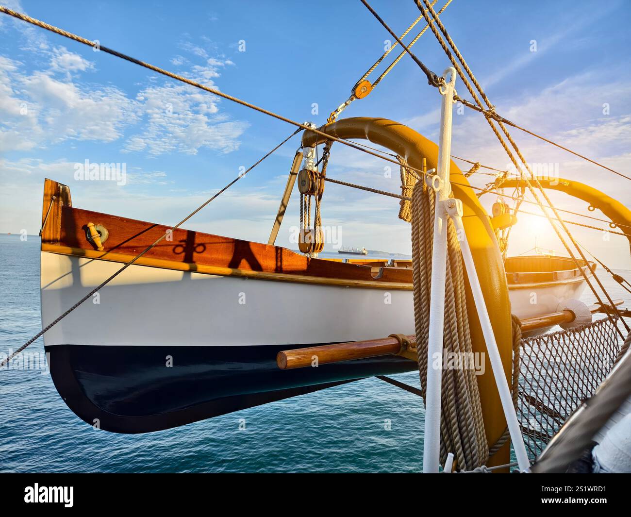 A lifeboat is securely tied to the mast of a sailing vessel Stock Photo - Alamy