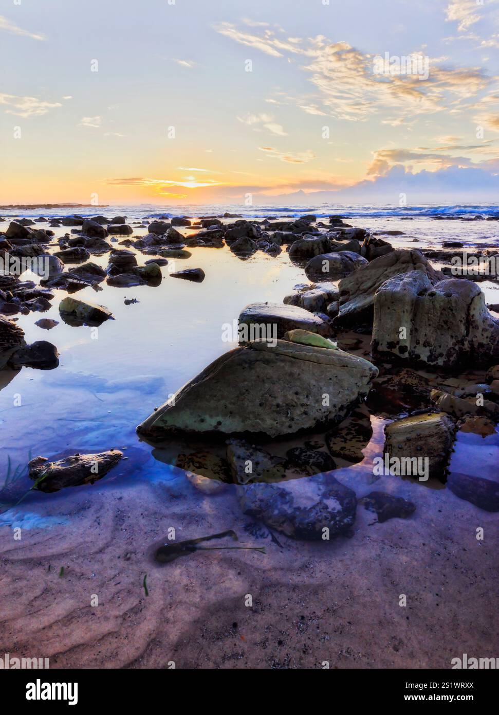 Scenic seascape at sunrise at Hams beach on Pacific coast of Austrlaia ...