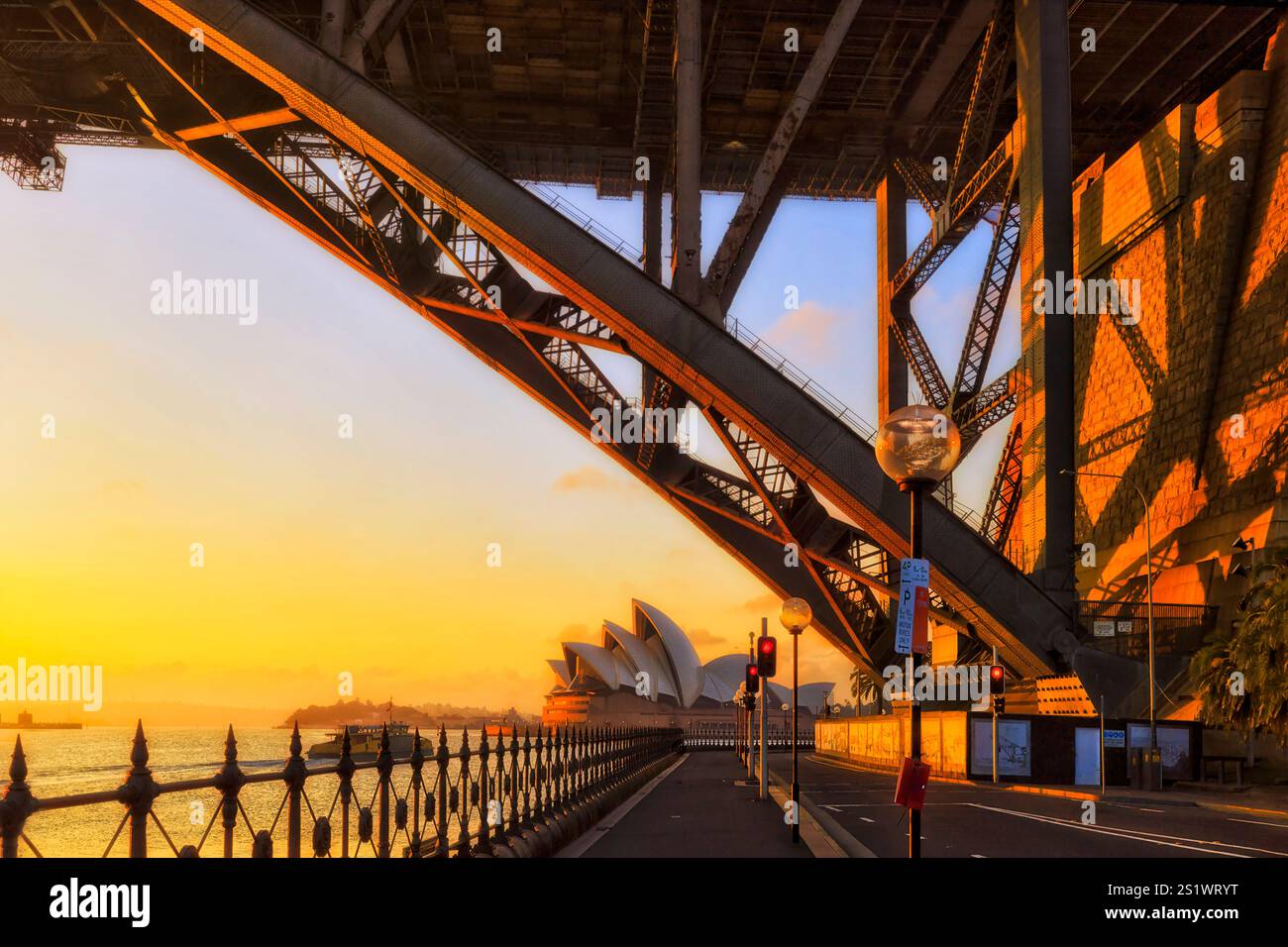 Under the massive steel historic Sydney Harbour bridge in the Rocks ...