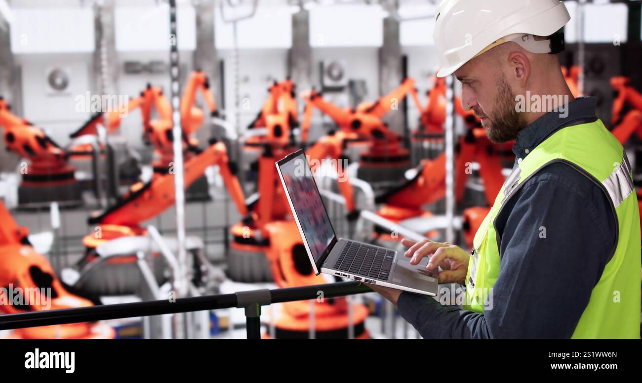 Men In Automotive Car Factory Using Scada System Stock Photo - Alamy